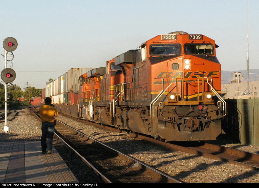 BNSF 7339 leads a stack train into the station on main 2